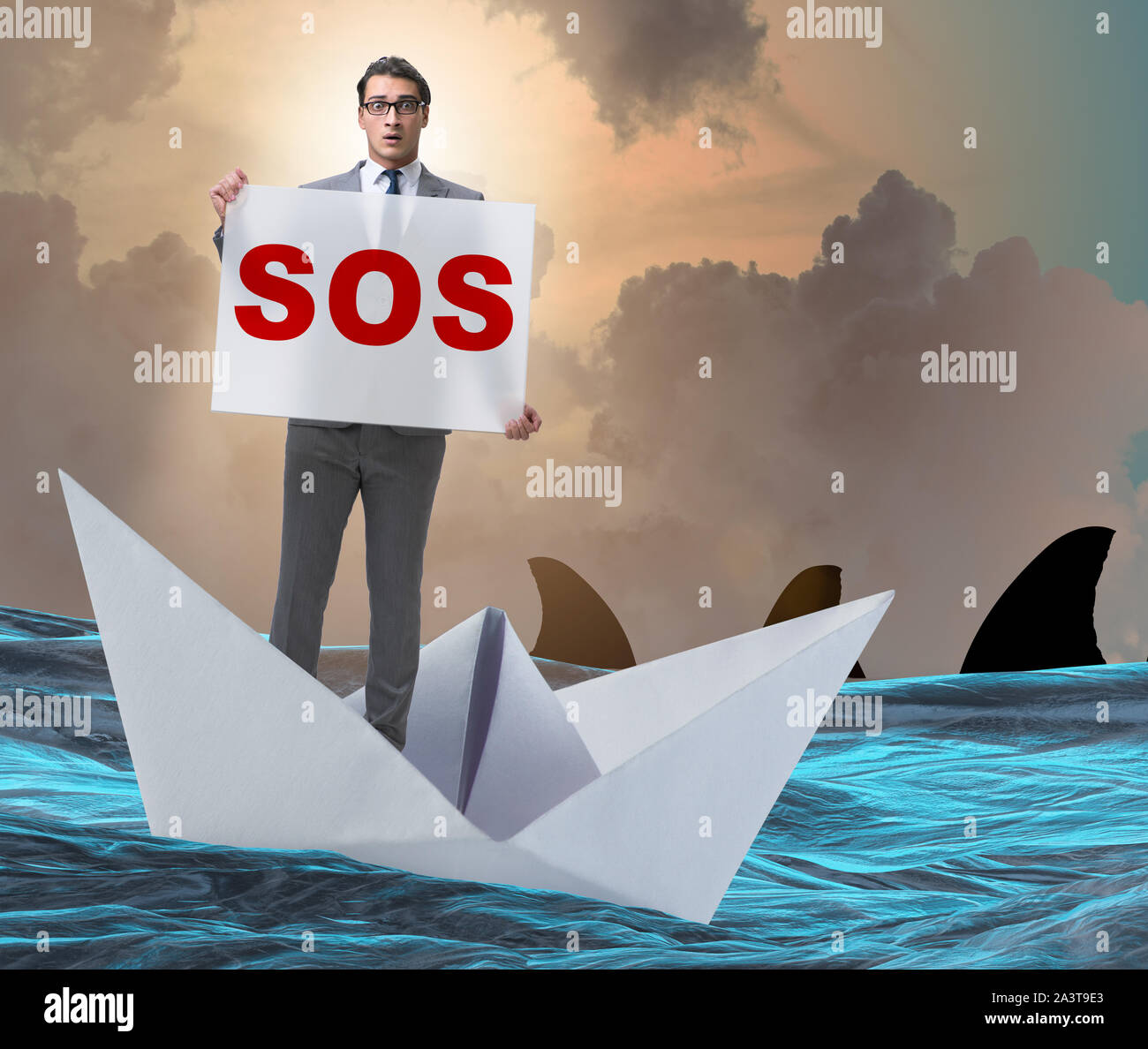 The businessman asking for help with sos message on boat Stock Photo ...