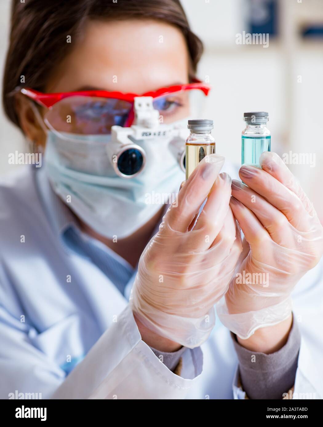The lab assistant in drug synthesis concept Stock Photo - Alamy