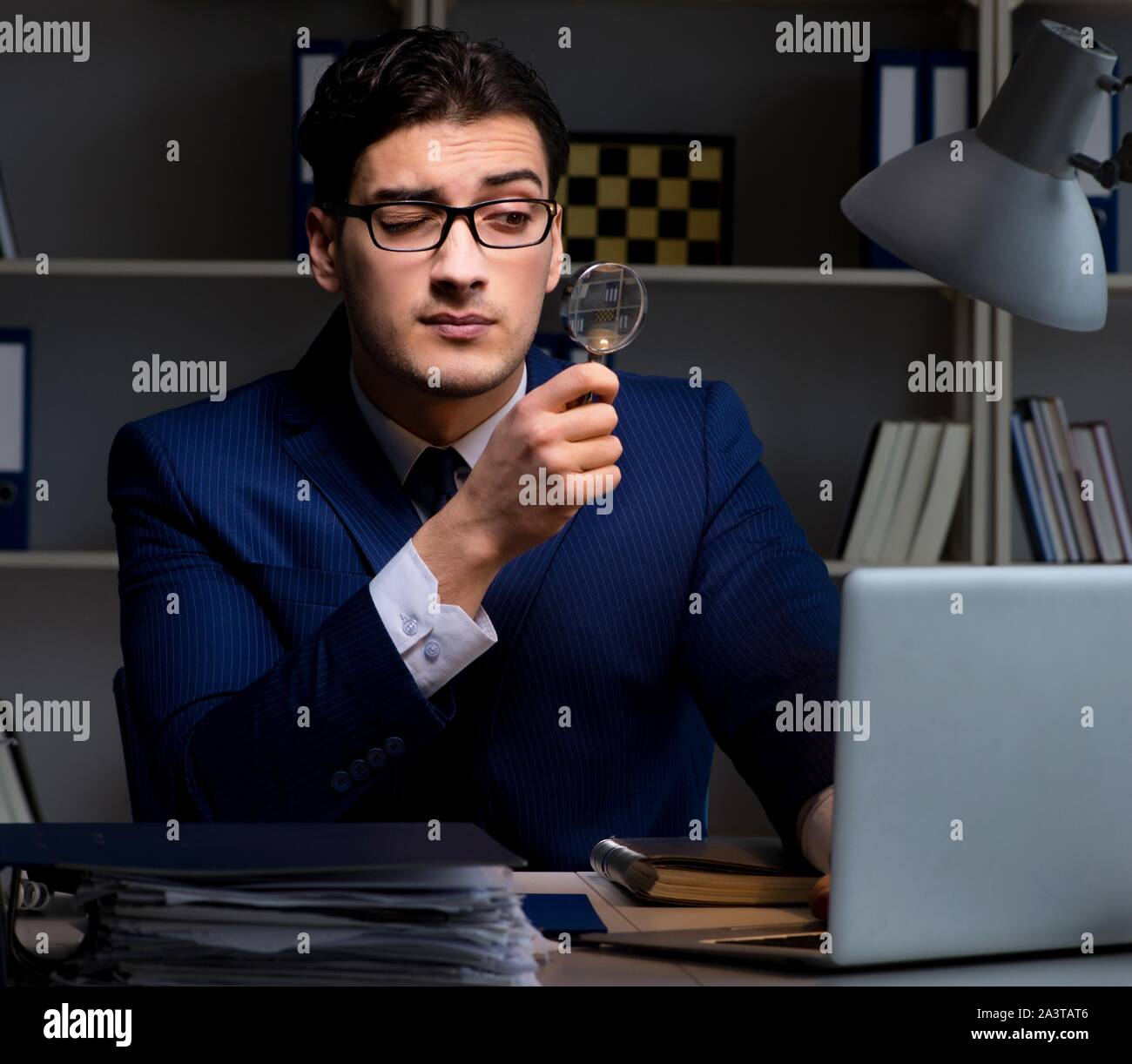 Auditor looking for errors in financial reporting for company Stock ...