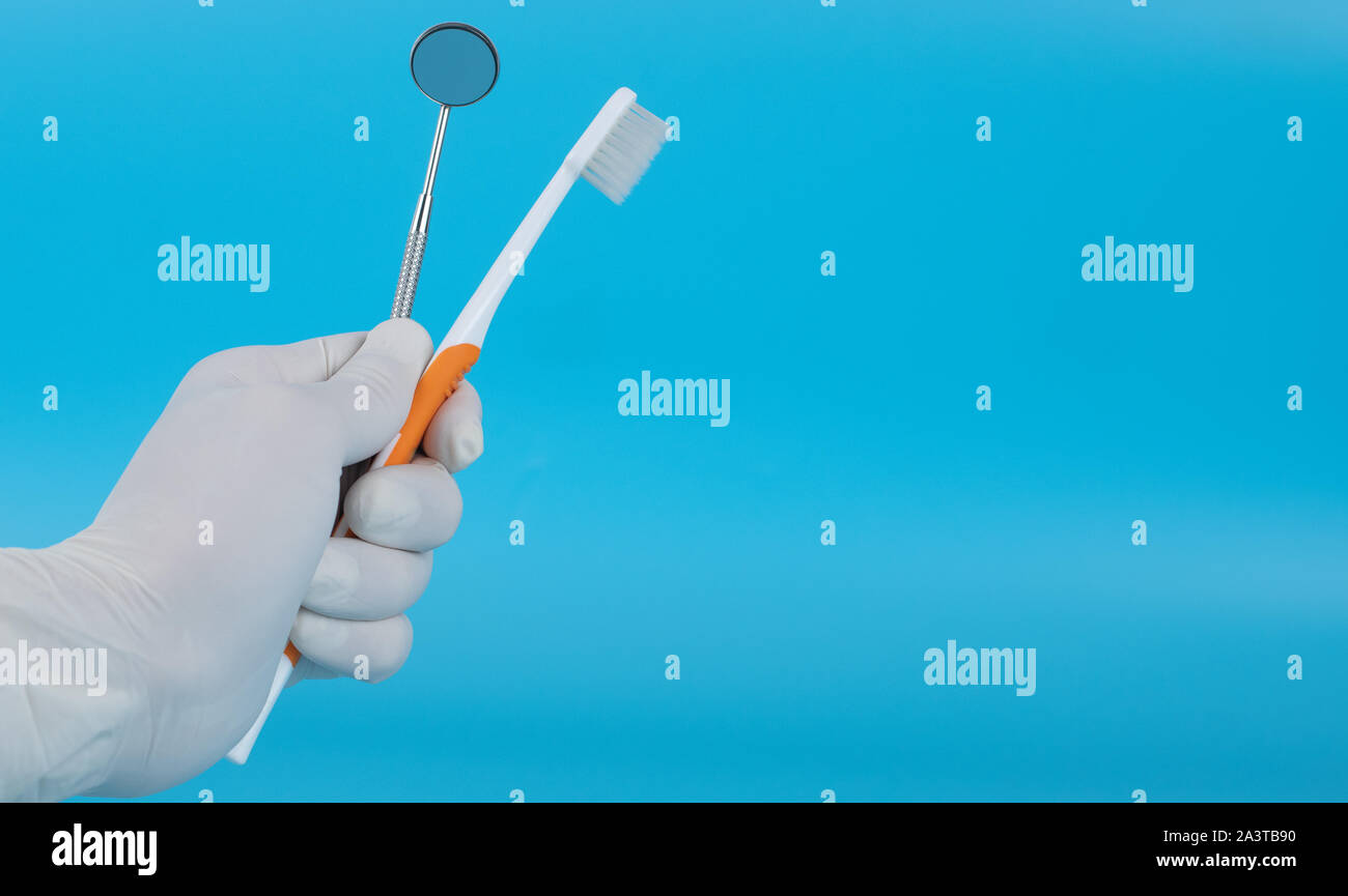 Female dentist tooth brush hi-res stock photography and images - Alamy