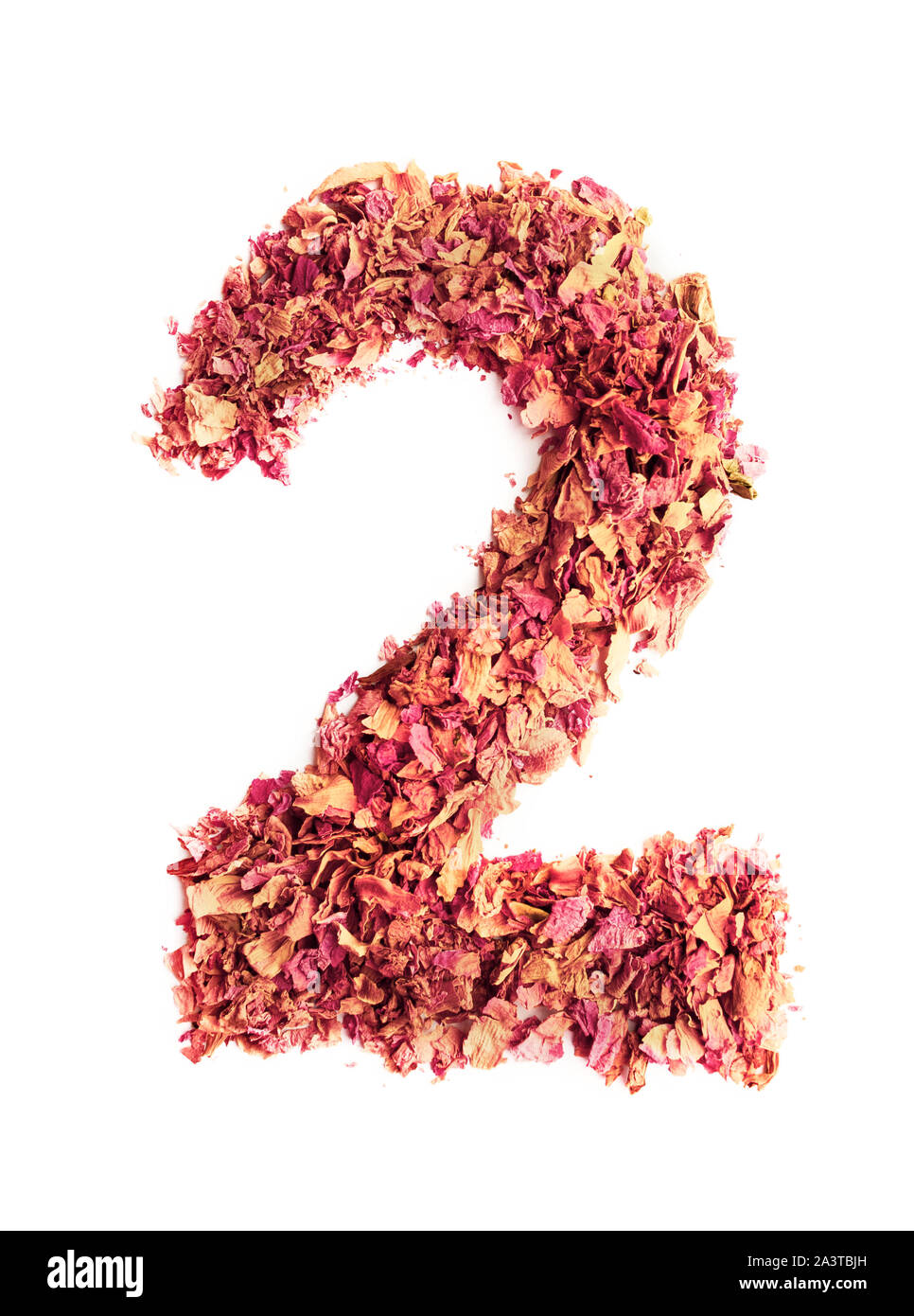 Number 2, made of rose petals, isolated on white background. Food ...