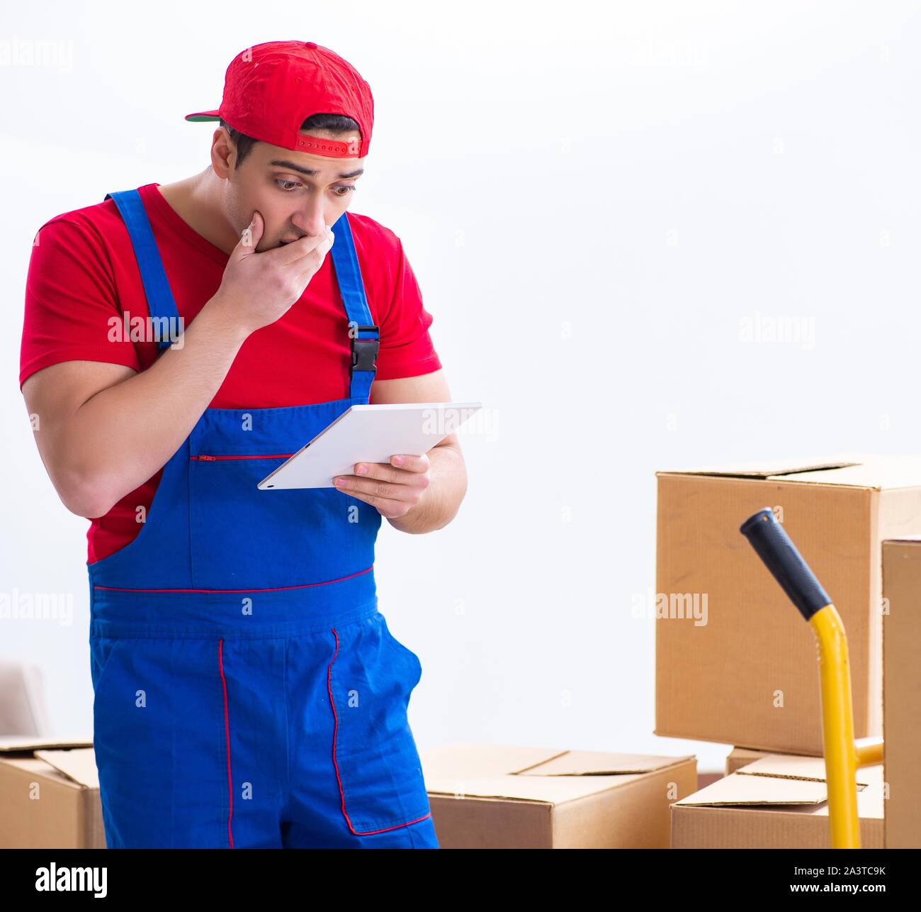 The contractor worker moving boxes during office move Stock Photo - Alamy