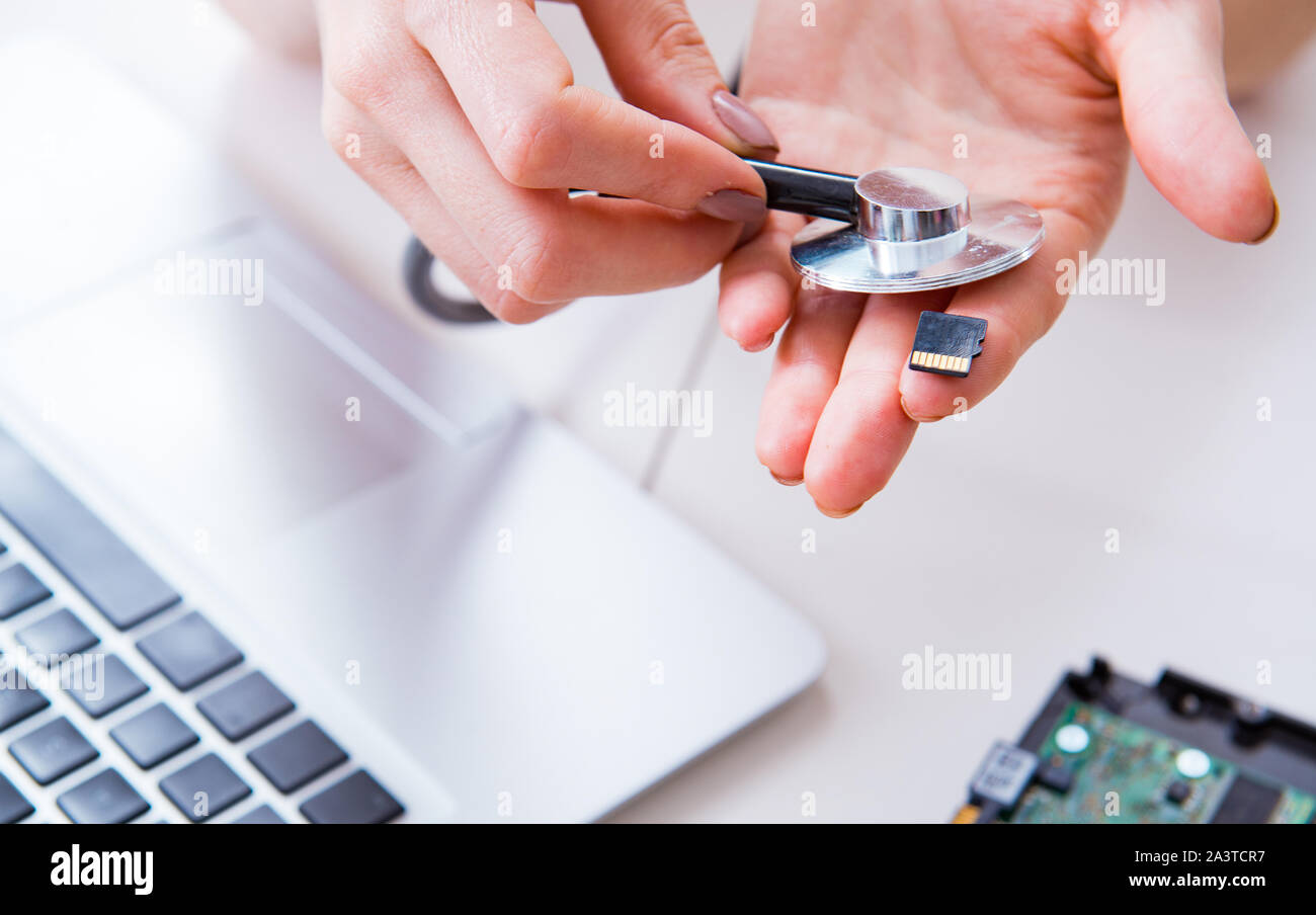 The hard drive repair and data recovery with restoration Stock Photo ...