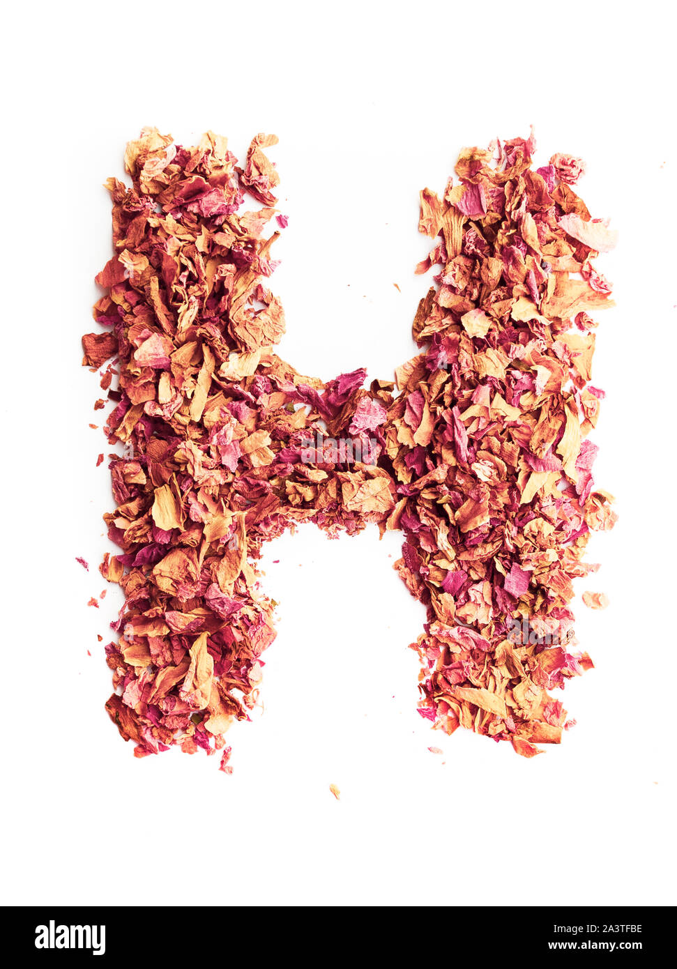 Letter H, made of rose petals, isolated on white background. Food ...