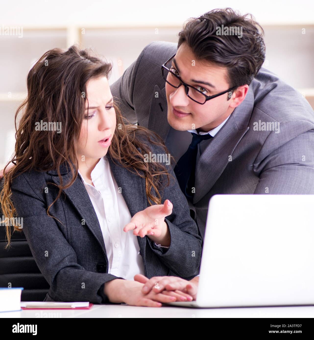 The unhappy boss having a chat with his secretary Stock Photo - Alamy