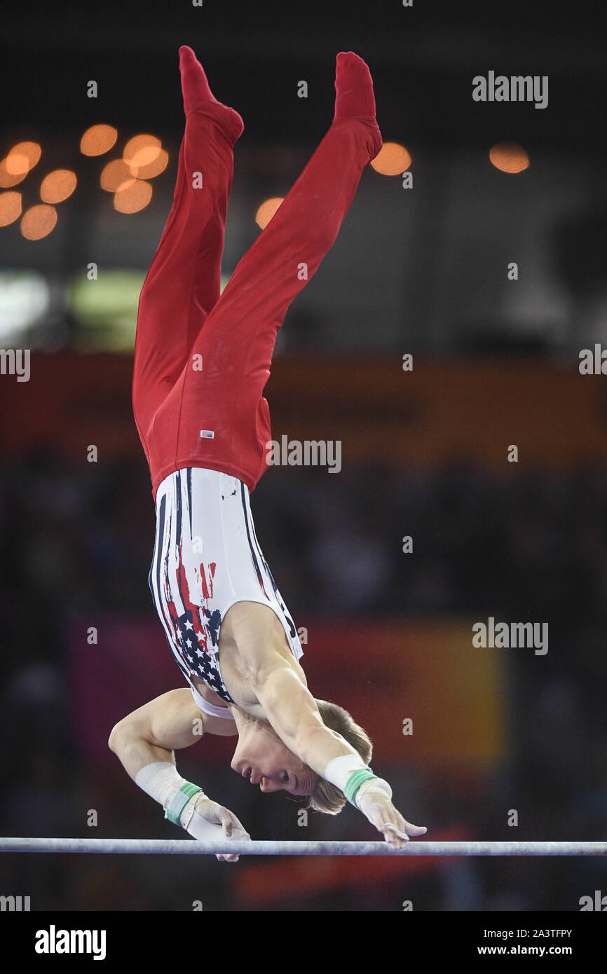 October 9, 2019: SHANE WISKUS reaches for the bar during a release move ...