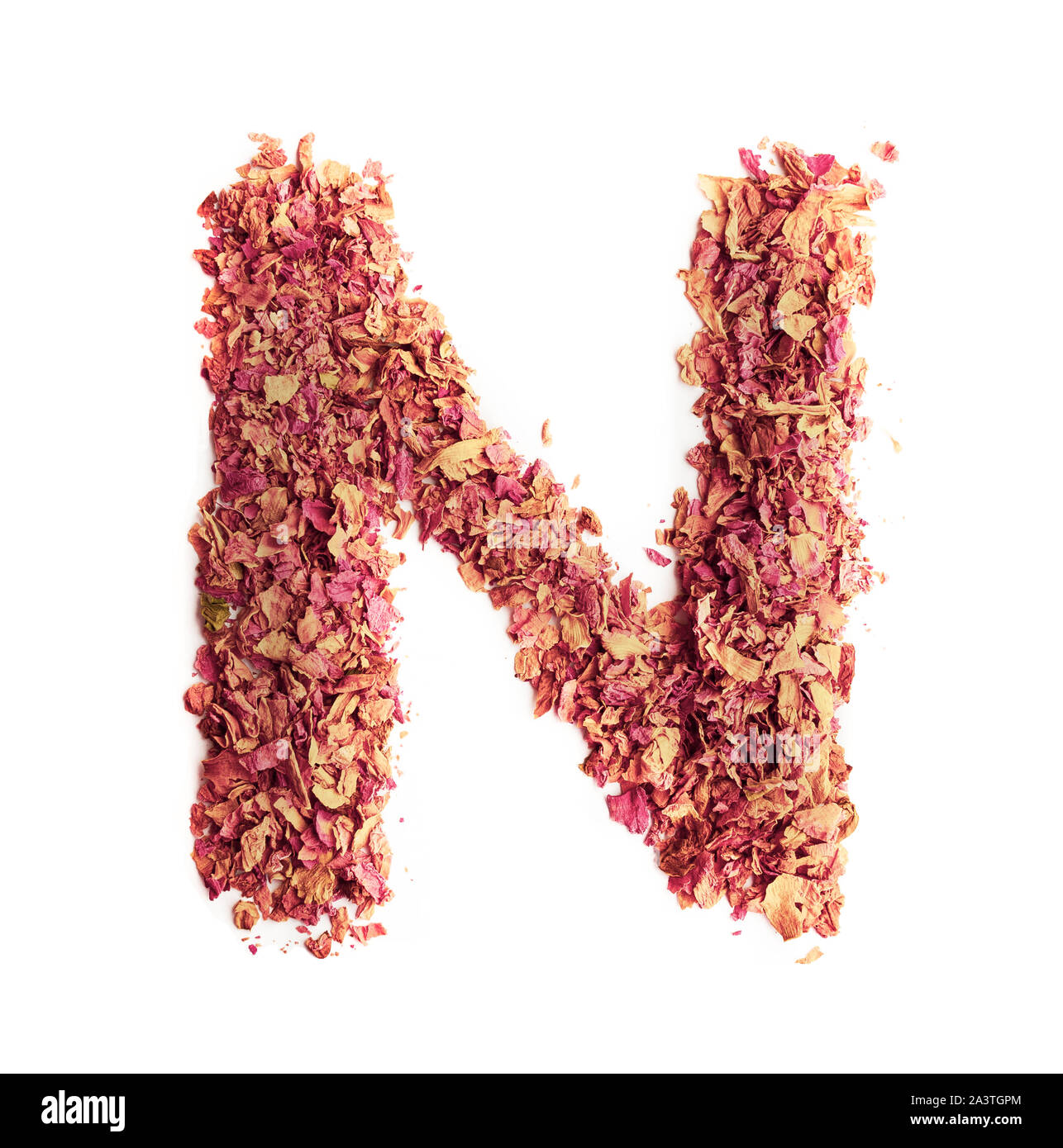 Letter N made of rose petals, isolated on white background. Food ...