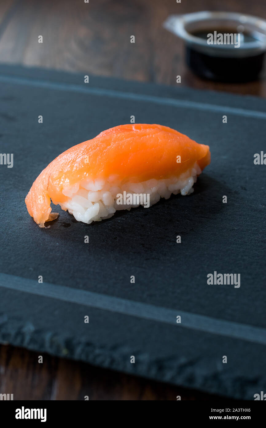 Sake Nigiri Sushi with Ginger, Wasabi, Soy Sauce and Chopsticks ...