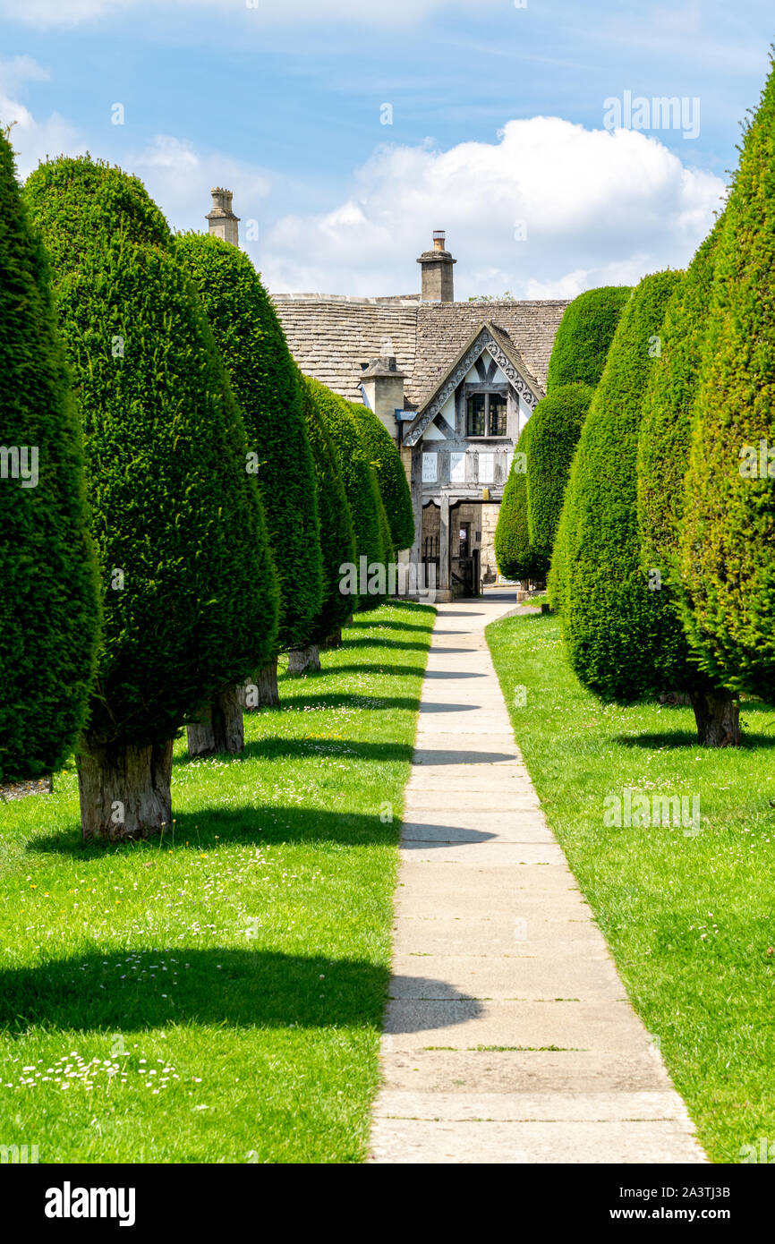 The churchyard of St Mary, Painswick, featuring 99 topiary yew trees ...