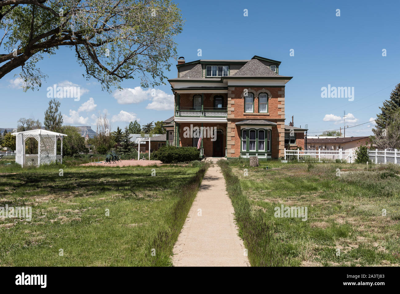 The 1889, Italianate-style Bauer Mansion, constructed of red bricks ...