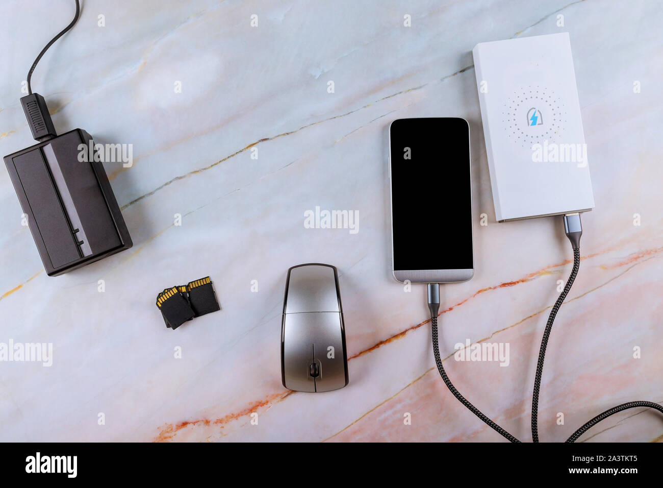 Workplace a charging phone in the powerbank on technology connect with ...