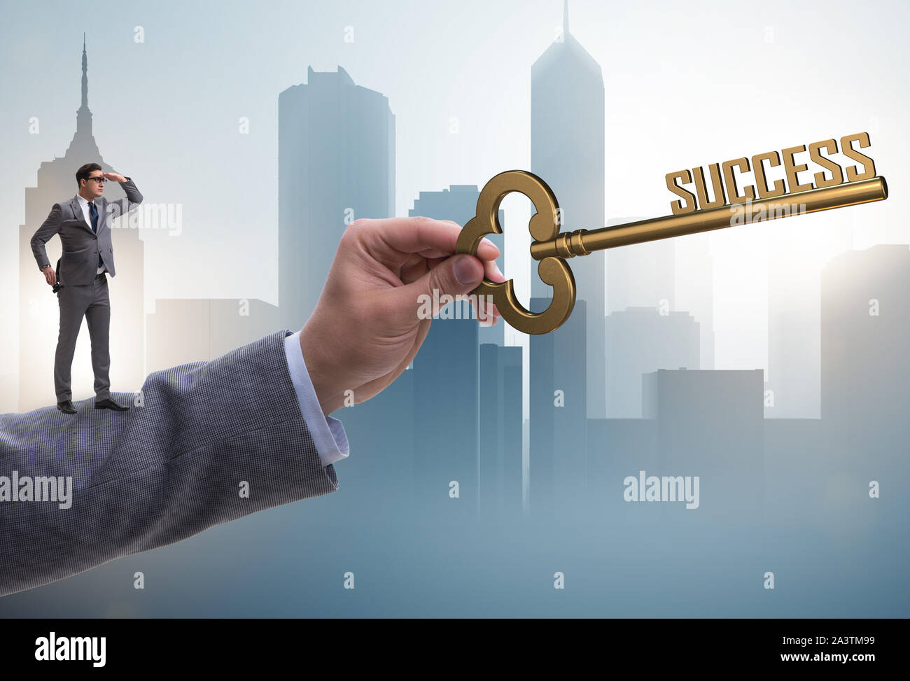 The businessman with key to success business concept Stock Photo - Alamy