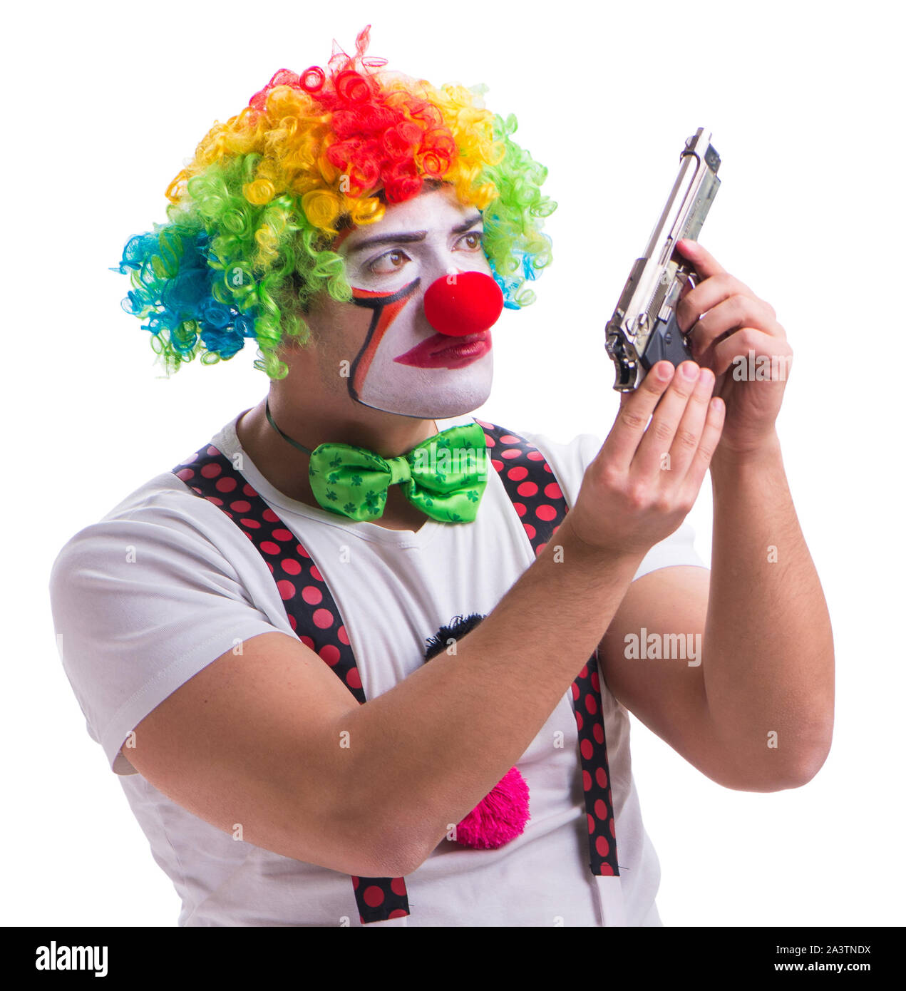 The funny clown with a gun pistol isolated on white background Stock ...