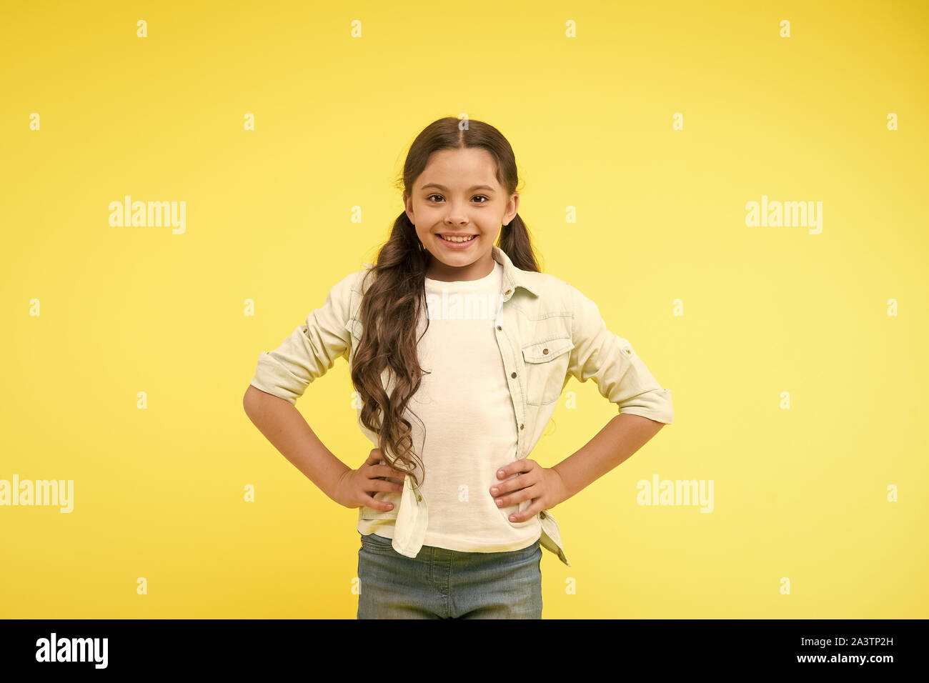 Happy confident child keep hands on hips. Cheerful and confident ...