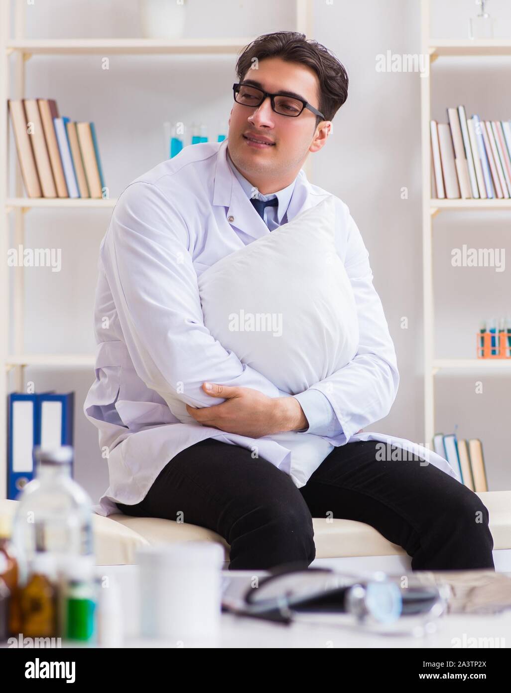 Doctor relaxing after complex surgery in hospital Stock Photo - Alamy