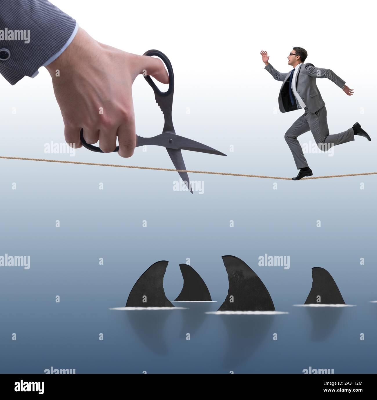 The hand cutting rope in business risk concept Stock Photo - Alamy
