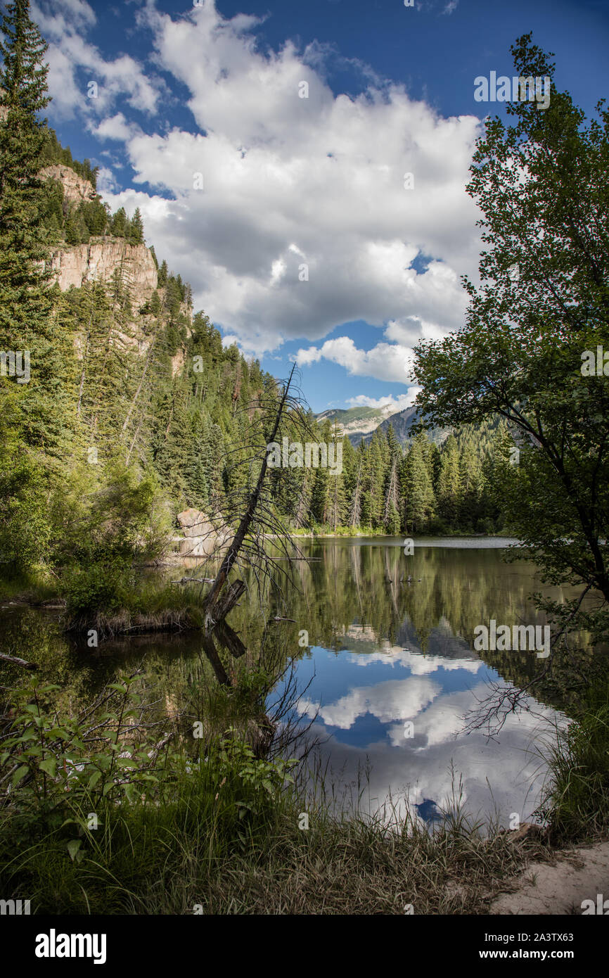 The alpine Lizard Lake at the base Sheep Mountain and Hat Mountain ...