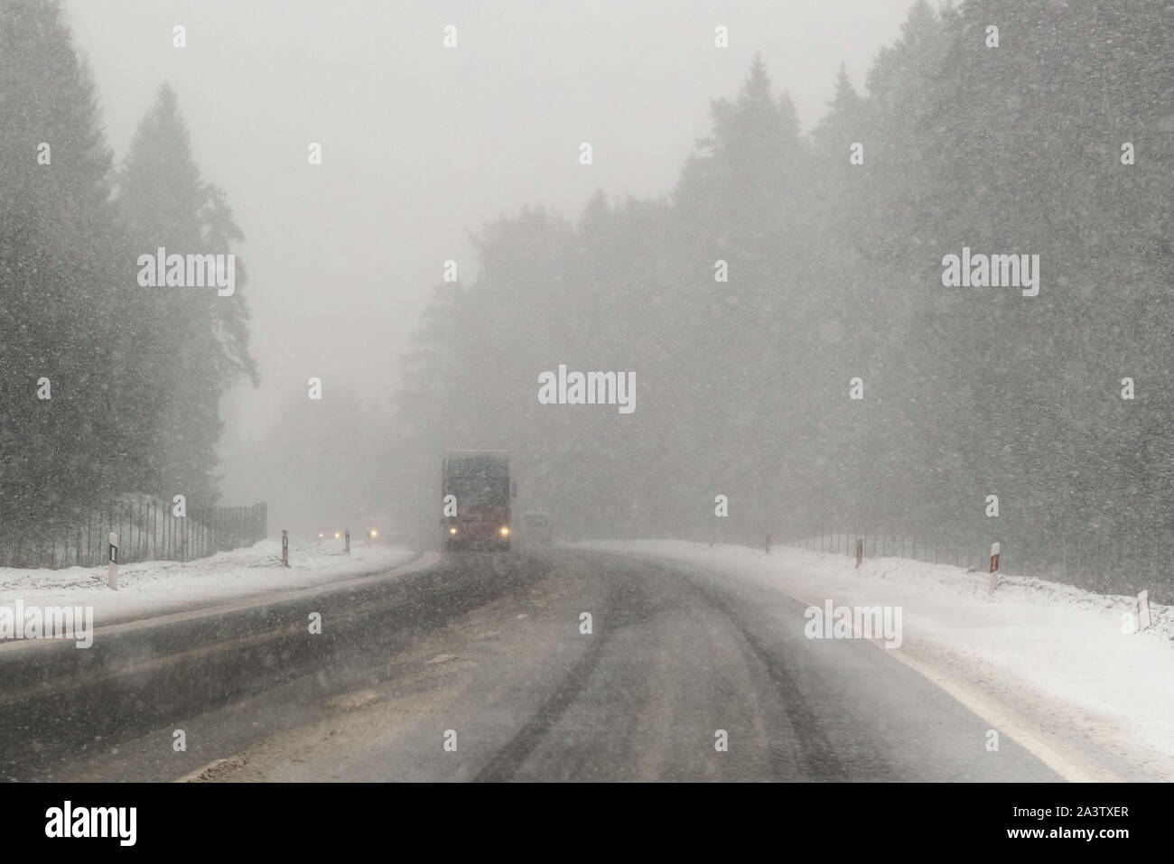 Driving car in snow storm on highway. Dangerous driving conditions ...