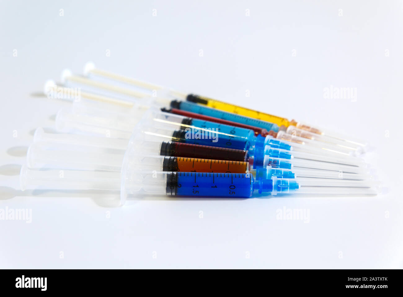 Medical syringes with colorful injections for cosmetology. Syringes ...