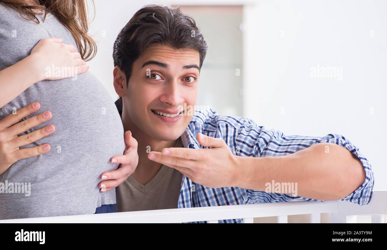 Young parents expecting their first baby Stock Photo - Alamy