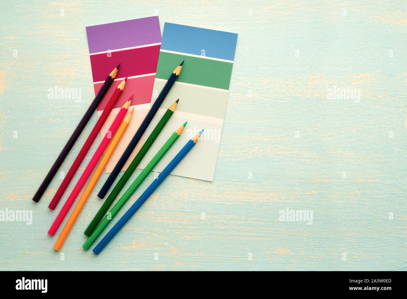 Colored wooden pencils on a white background. Creativity and drawing ...