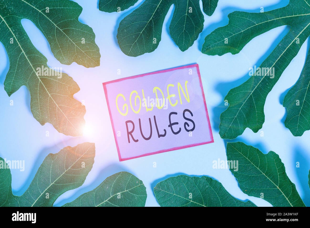 Writing note showing Golden Rules. Business concept for basic principle ...