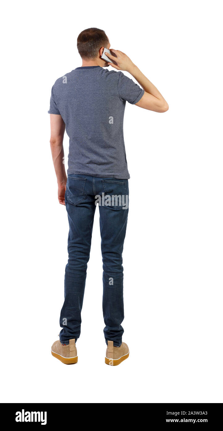 back view of a man talking on the phone. backside view of person. Rear ...