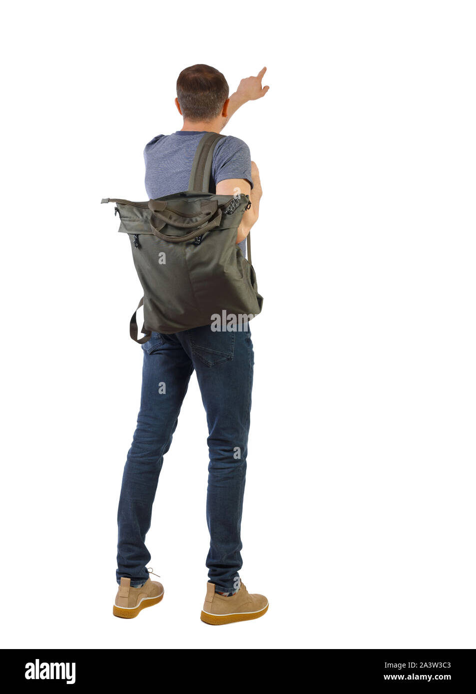 Back view of a man with a green backpack pointing forward. backside ...