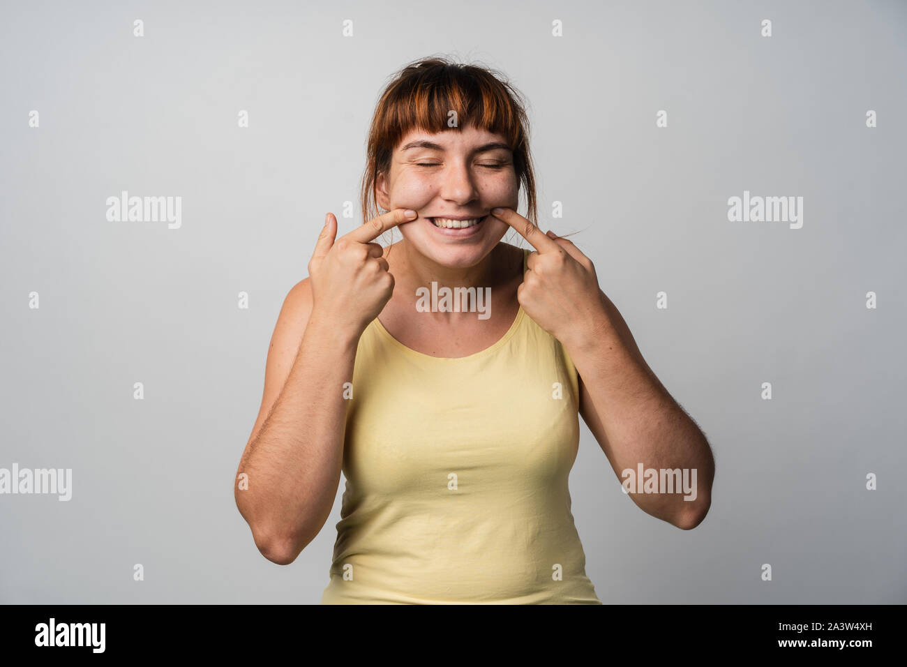 agressive wife look at camera. Studio with white background Stock Photo ...