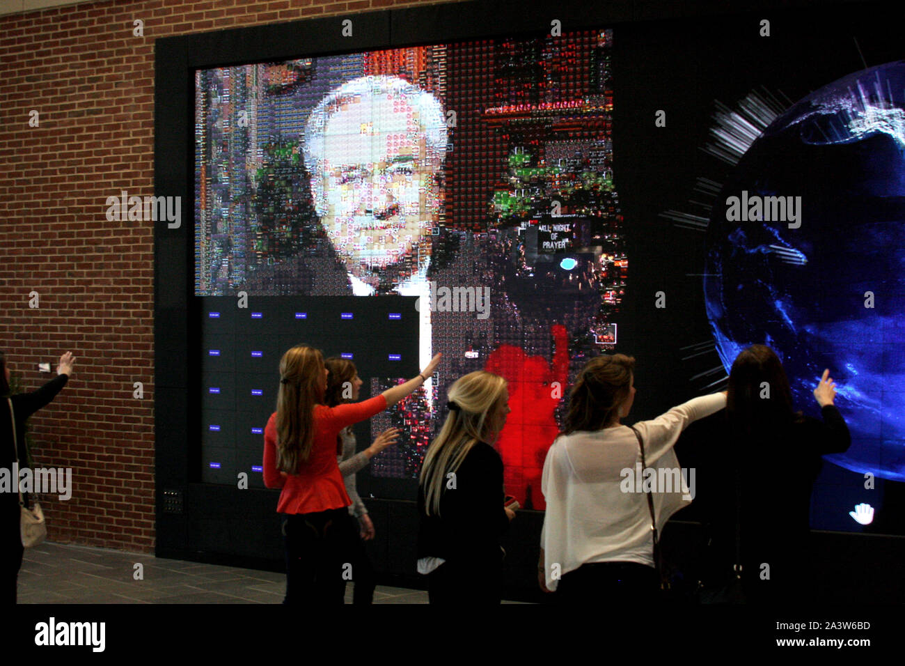 Students using the interactive screen inside Jerry Falwell Library at ...