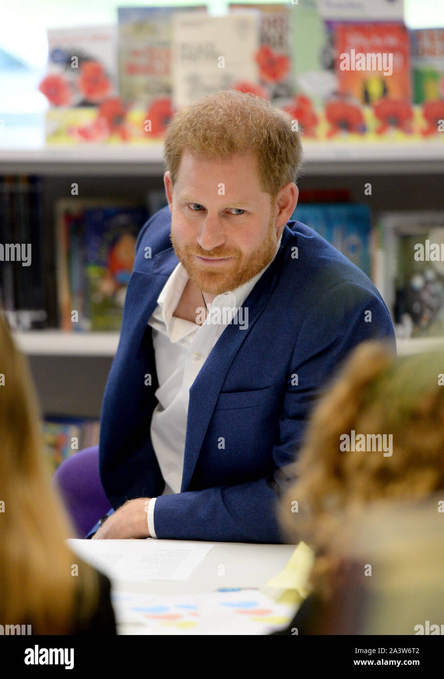 The Duke of Sussex speaks with pupils during a visit to the Nottingham ...