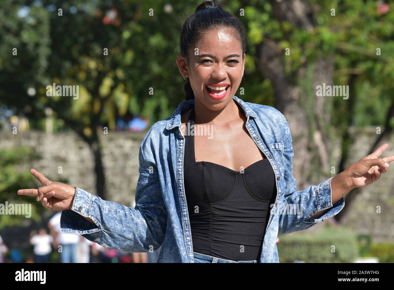 Female And Peace Sign Stock Photo - Alamy