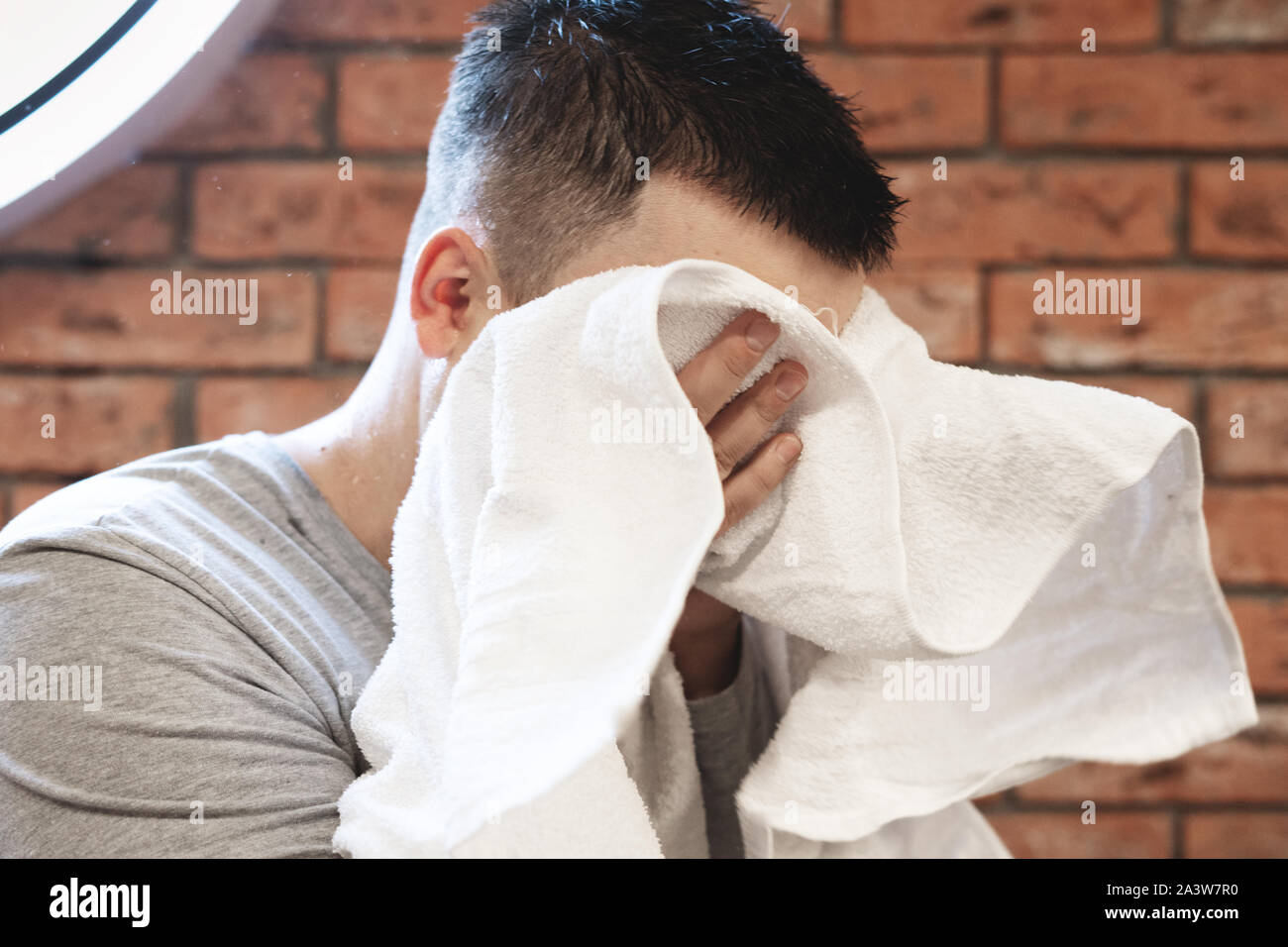 Man wiping face napkin hi-res stock photography and images - Alamy