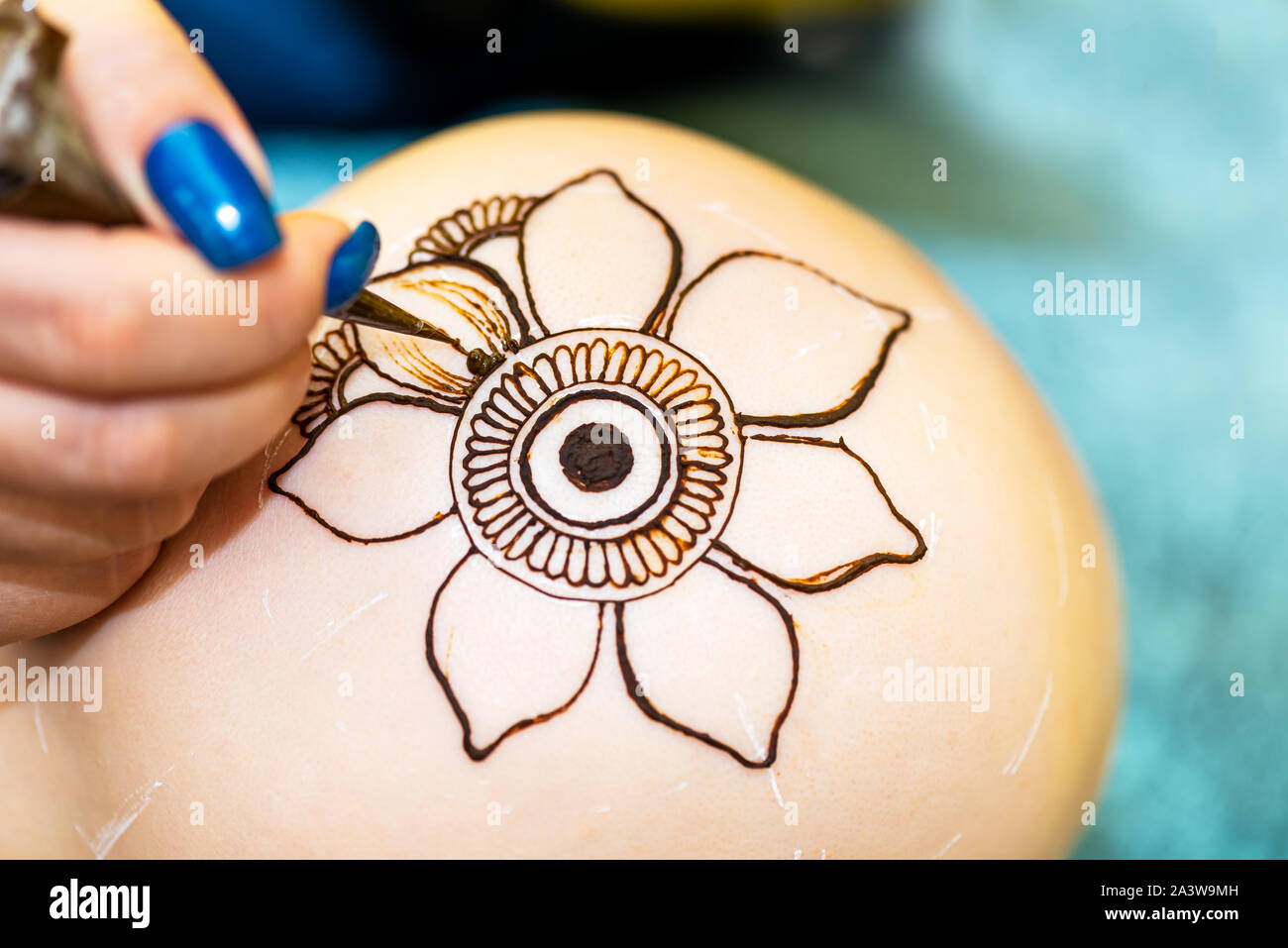 Drawing process of henna mehndi tattoo on womans bald head Stock Photo ...