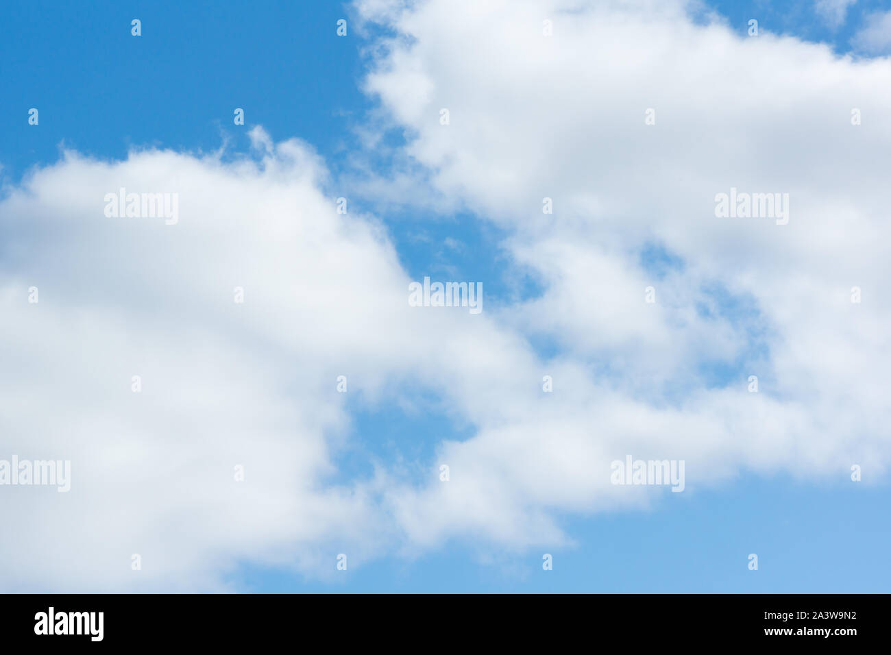blue sky with flying white light clouds Stock Photo - Alamy