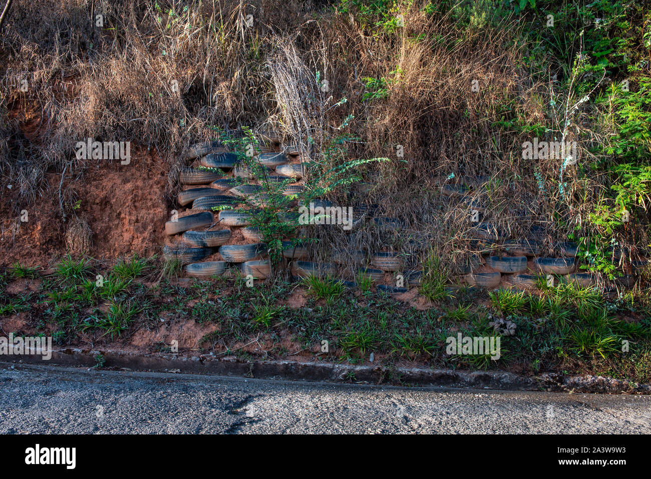Erosion and landslide prevention with the use of tires on sand and clay ...
