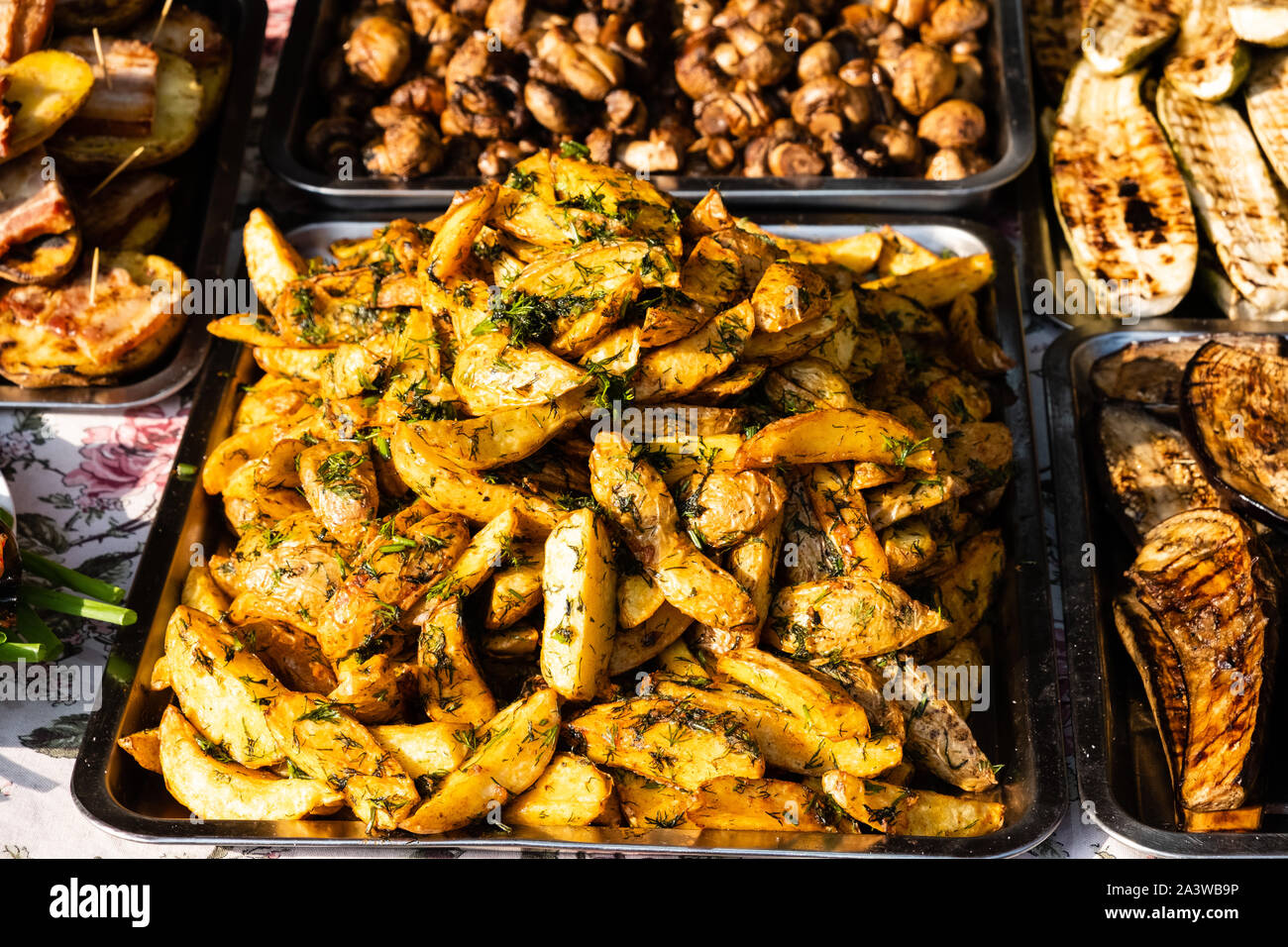 delicious vegetables grilling in open grill, outdoor kitchen. food ...