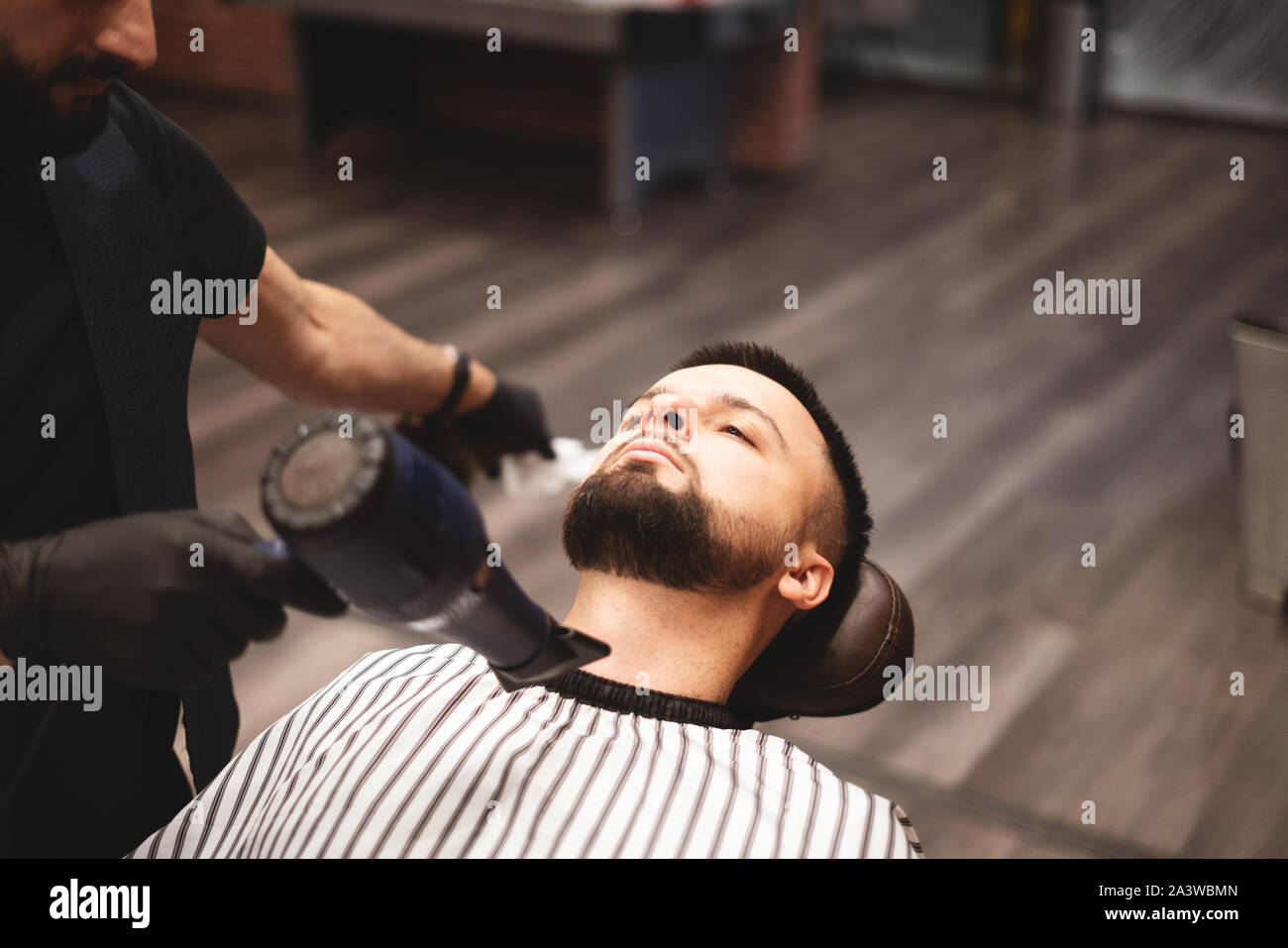 Barber Cutting Beard Customer High Resolution Stock Photography and ...