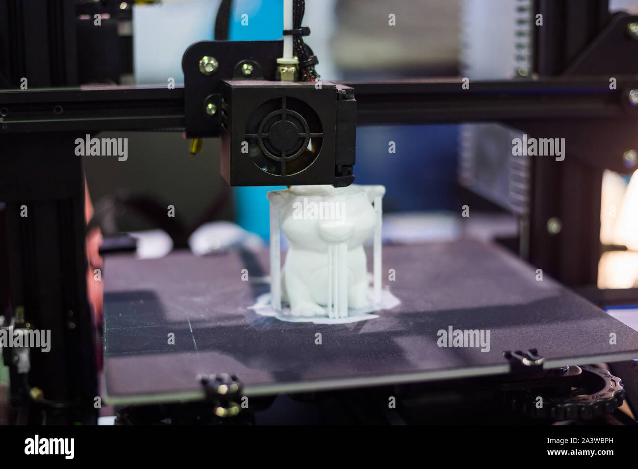 Three dimensional printing machine prints physical 3D model Stock Photo ...