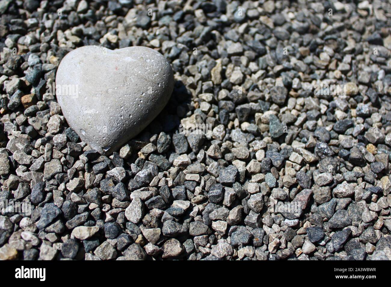 The picture shows a heart of stone Stock Photo - Alamy