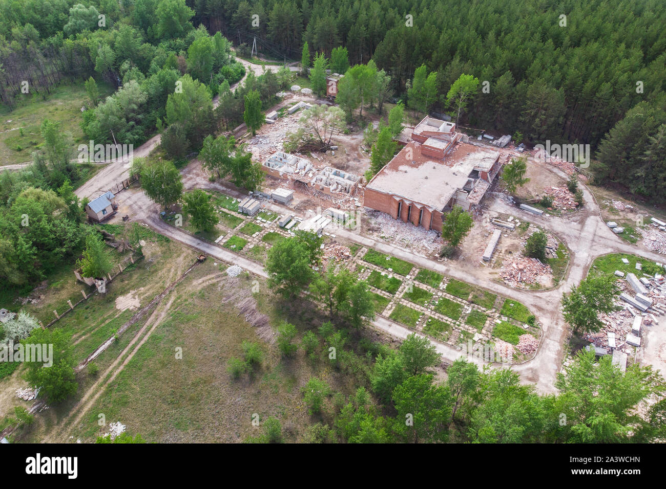 Aerial drone view of old demolished industrial building. Pile of ...