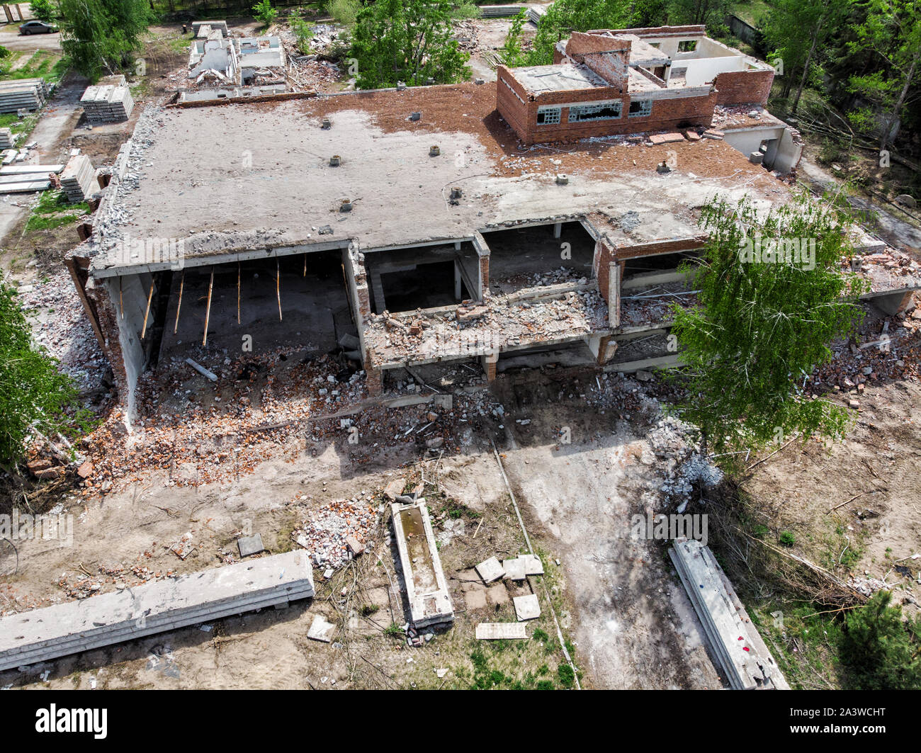 Aerial drone view of old demolished industrial building. Pile of ...