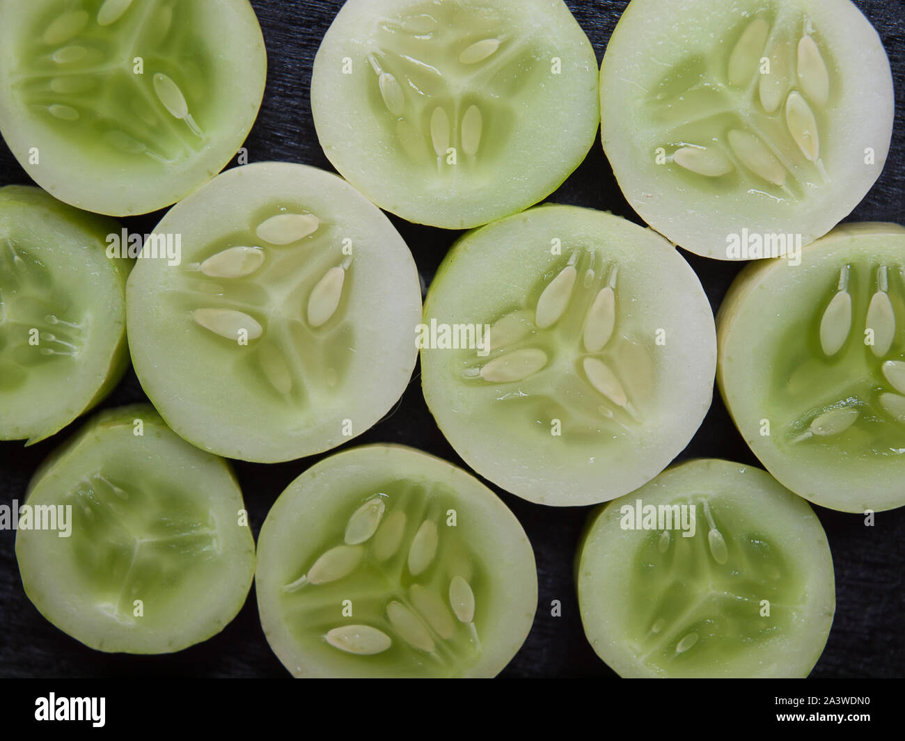 cucumber , Vegetables Healthy Foods. Black background Stock Photo - Alamy