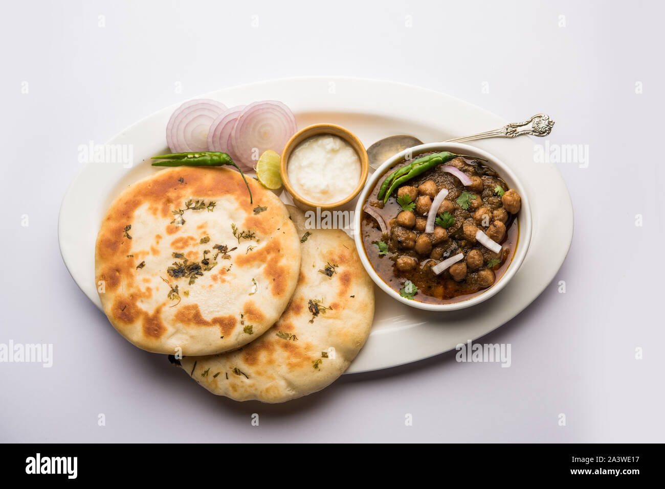 Pindi Chole Kulche or roadside choley Kulcha popular in India and ...