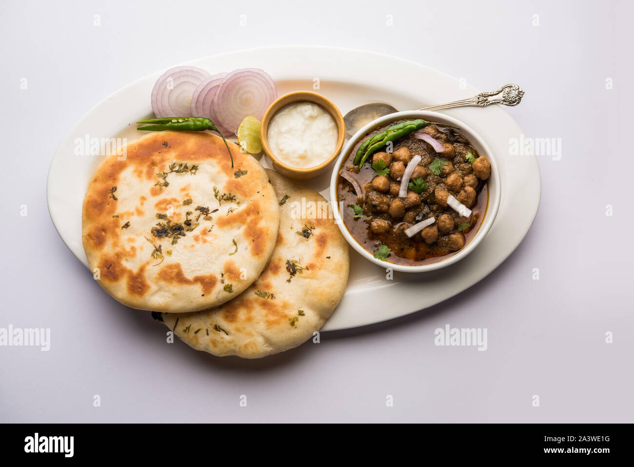 Pindi Chole Kulche or roadside choley Kulcha popular in India and ...