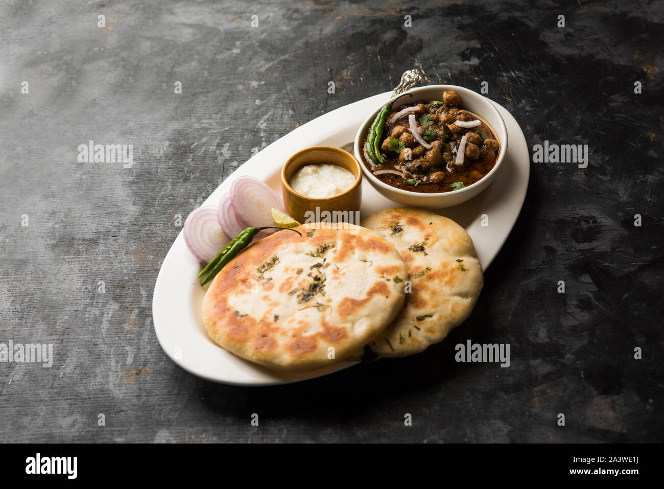 Pindi Chole Kulche or roadside choley Kulcha popular in India and ...