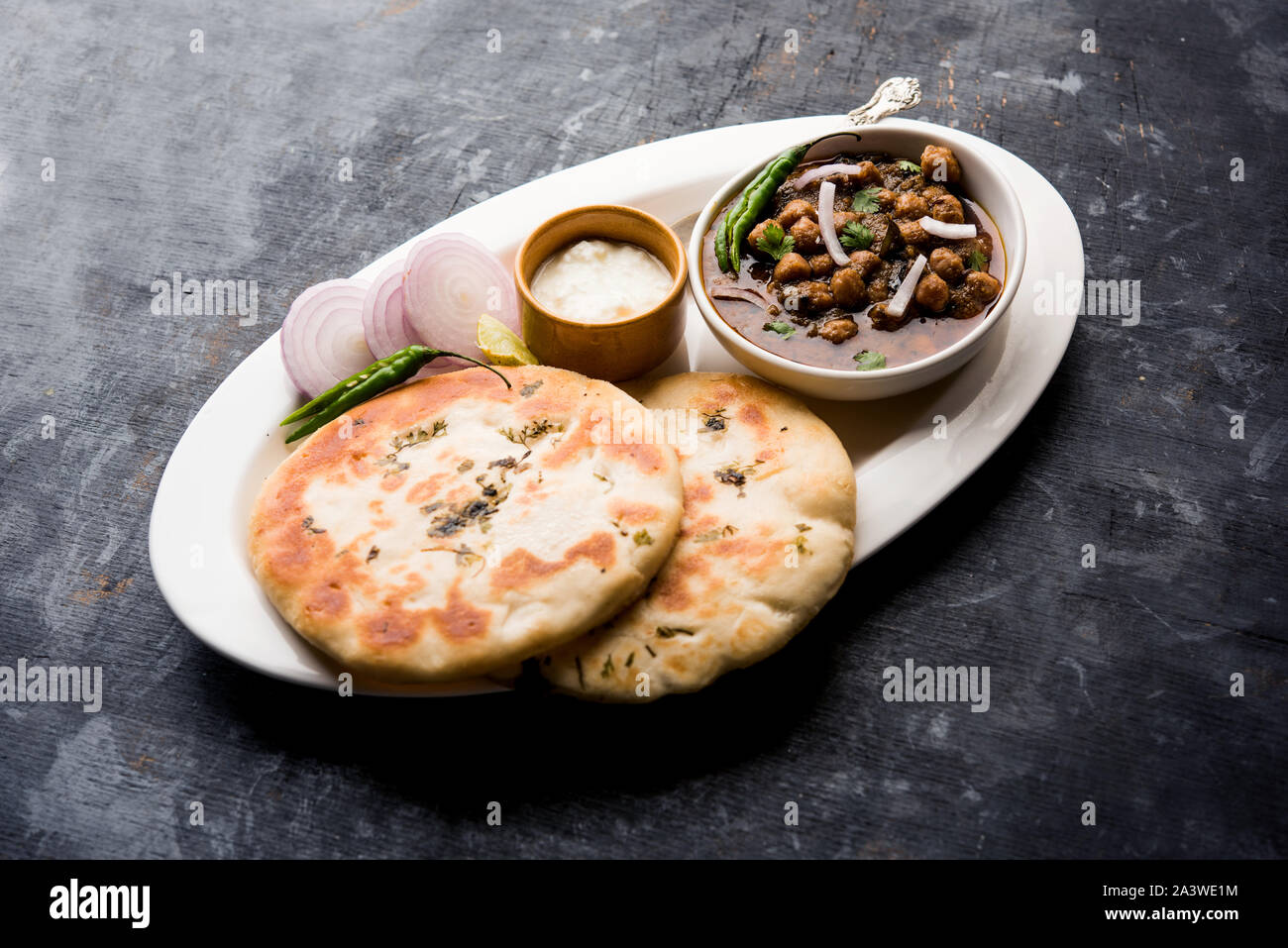 Pindi Chole Kulche or roadside choley Kulcha popular in India and ...