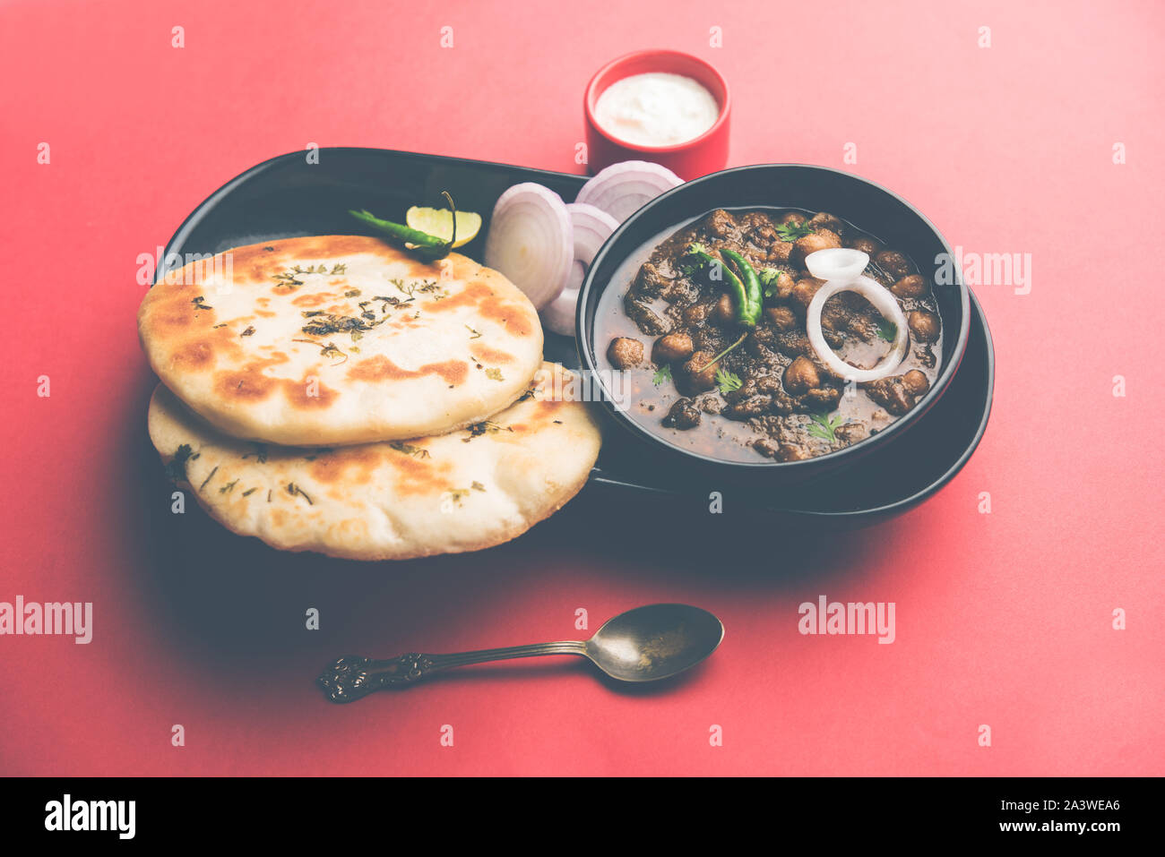 Pindi Chole Kulche or roadside choley Kulcha popular in India and ...