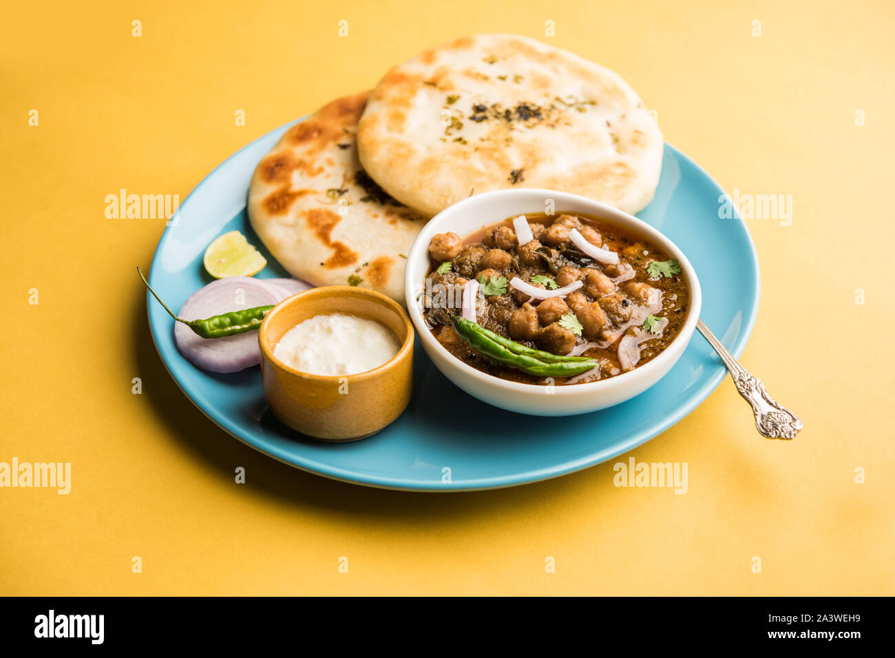Pindi Chole Kulche or roadside choley Kulcha popular in India and ...