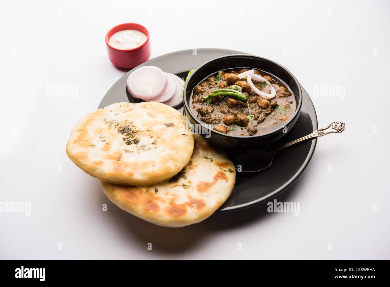 Pindi Chole Kulche or roadside choley Kulcha popular in India and ...